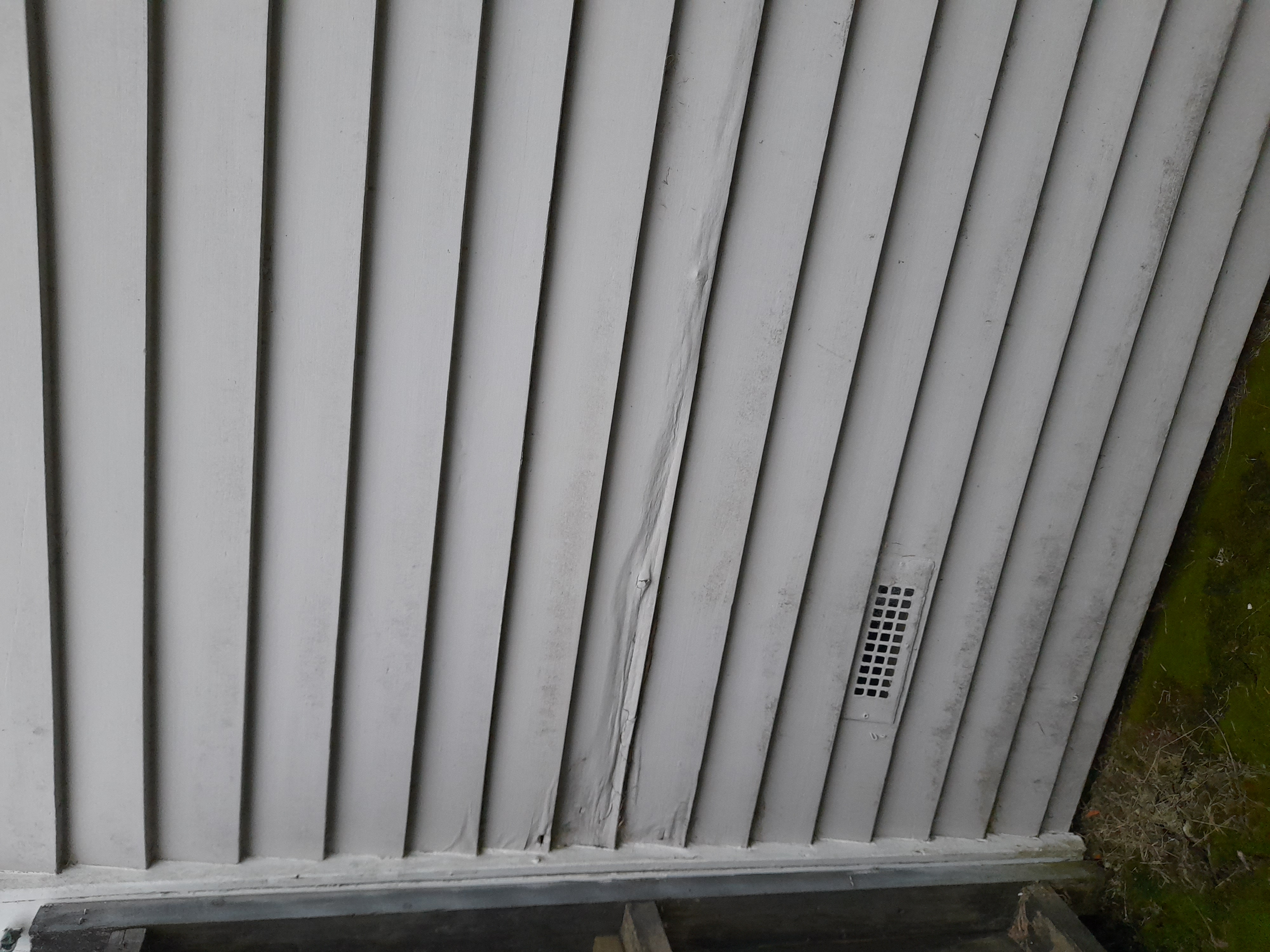 partial weatherboard replacement on side of wooden house | NoCowboys